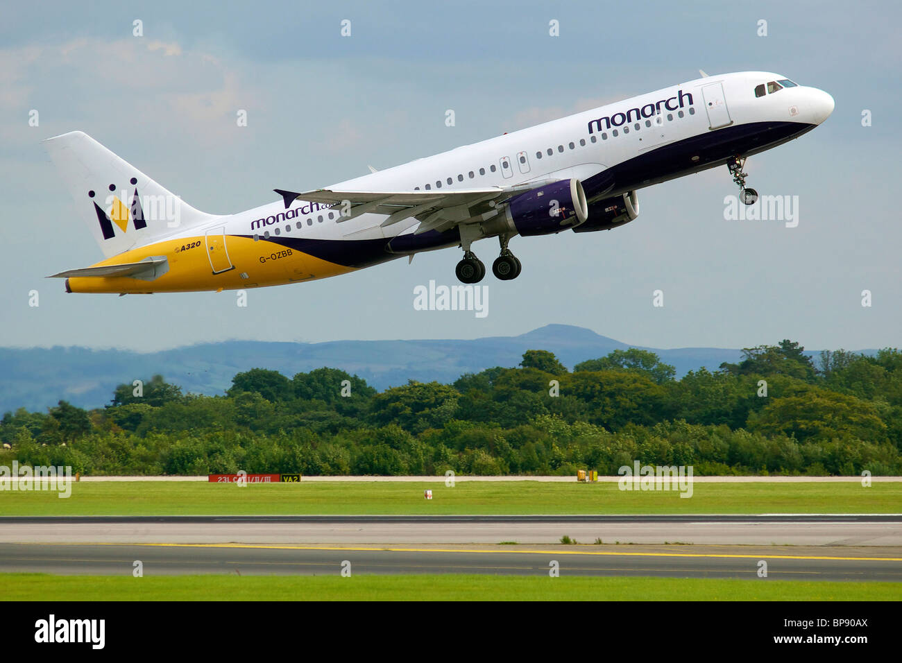 Aircraft aeroplane jet plane Manchester airport jetliner airbus Monarch ...