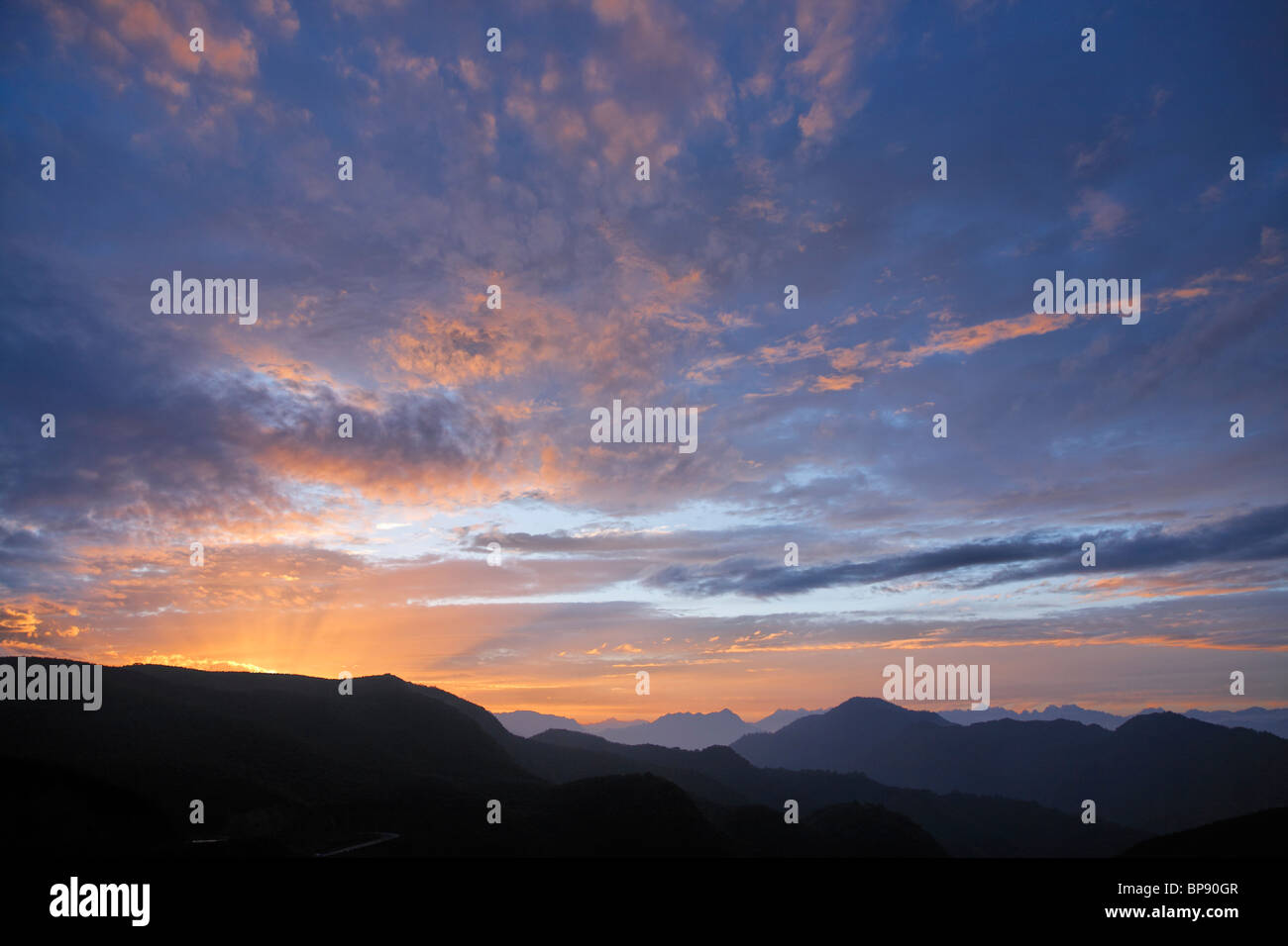 Beautiful Sunset Over a Mountain Range. Sichuan Province, China Stock ...