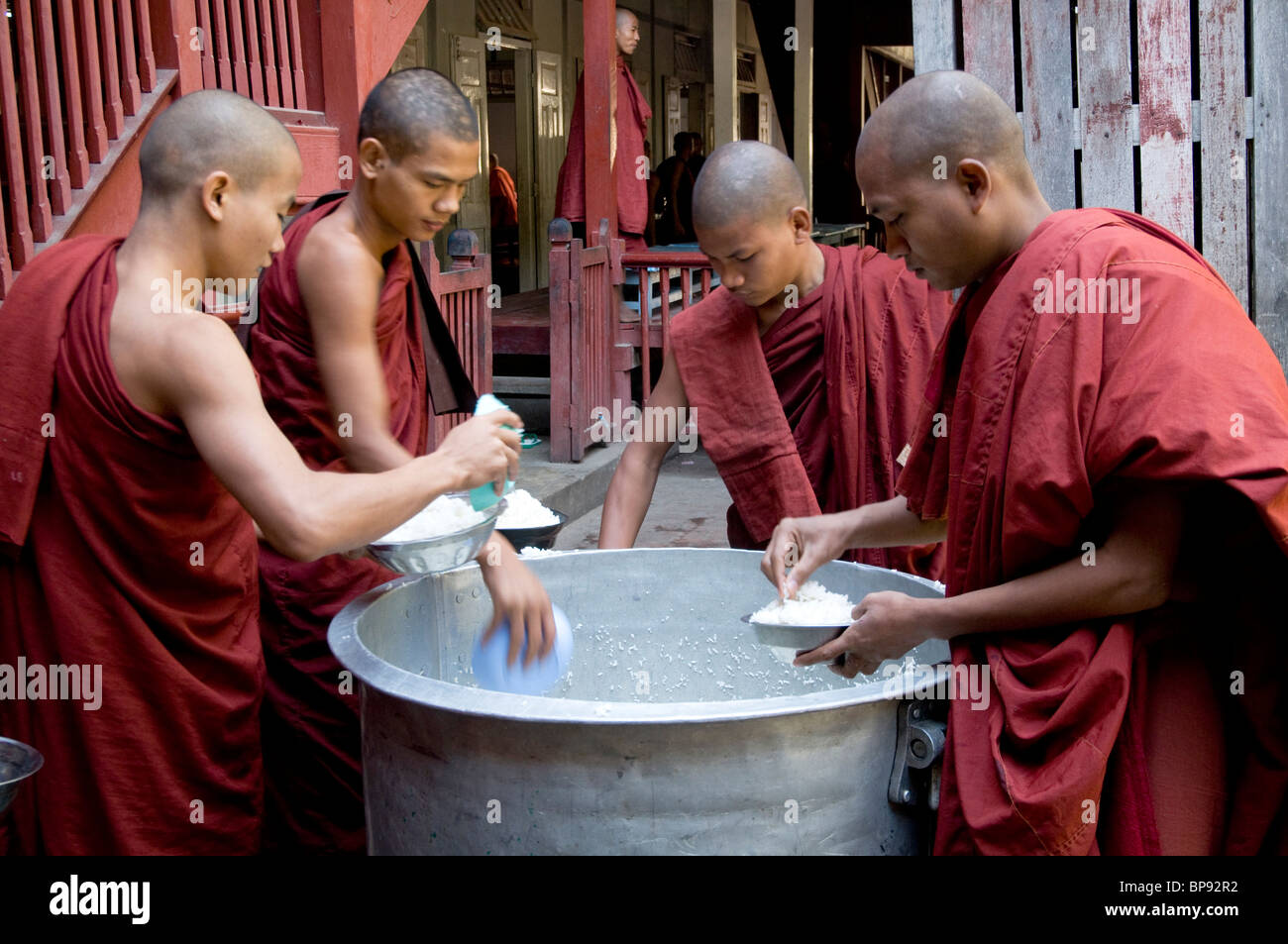 MYANMAR (BURMA) BUDDHIST MONKS TAKING FOOD GIVEN BY PEOPLE TO THEIR ...