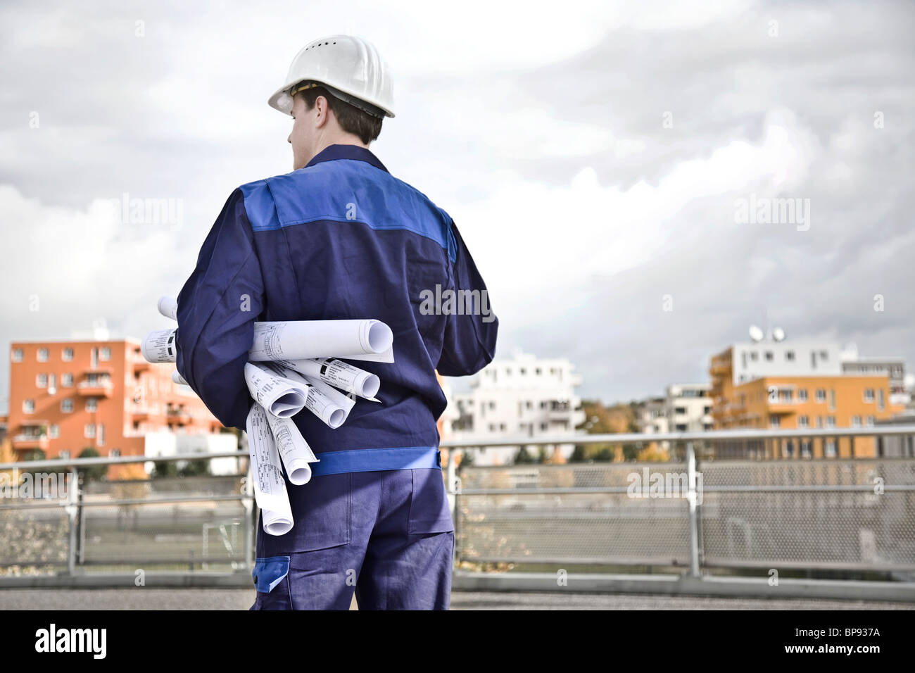 Construction worker with plans, Munich, Bavaria, Germany Stock Photo ...