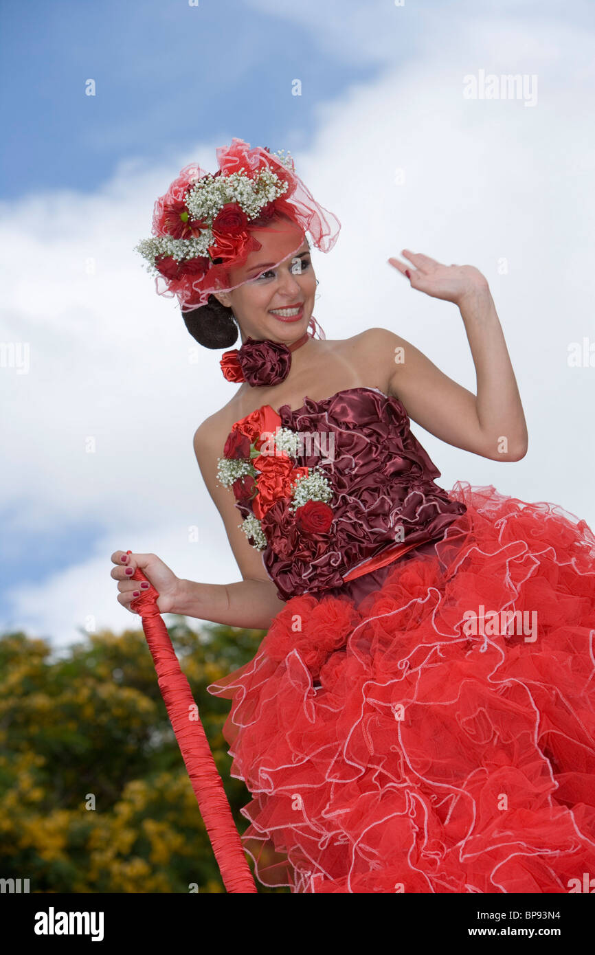 Woman with dress full of red roses at the Madeira Flower Festival ...
