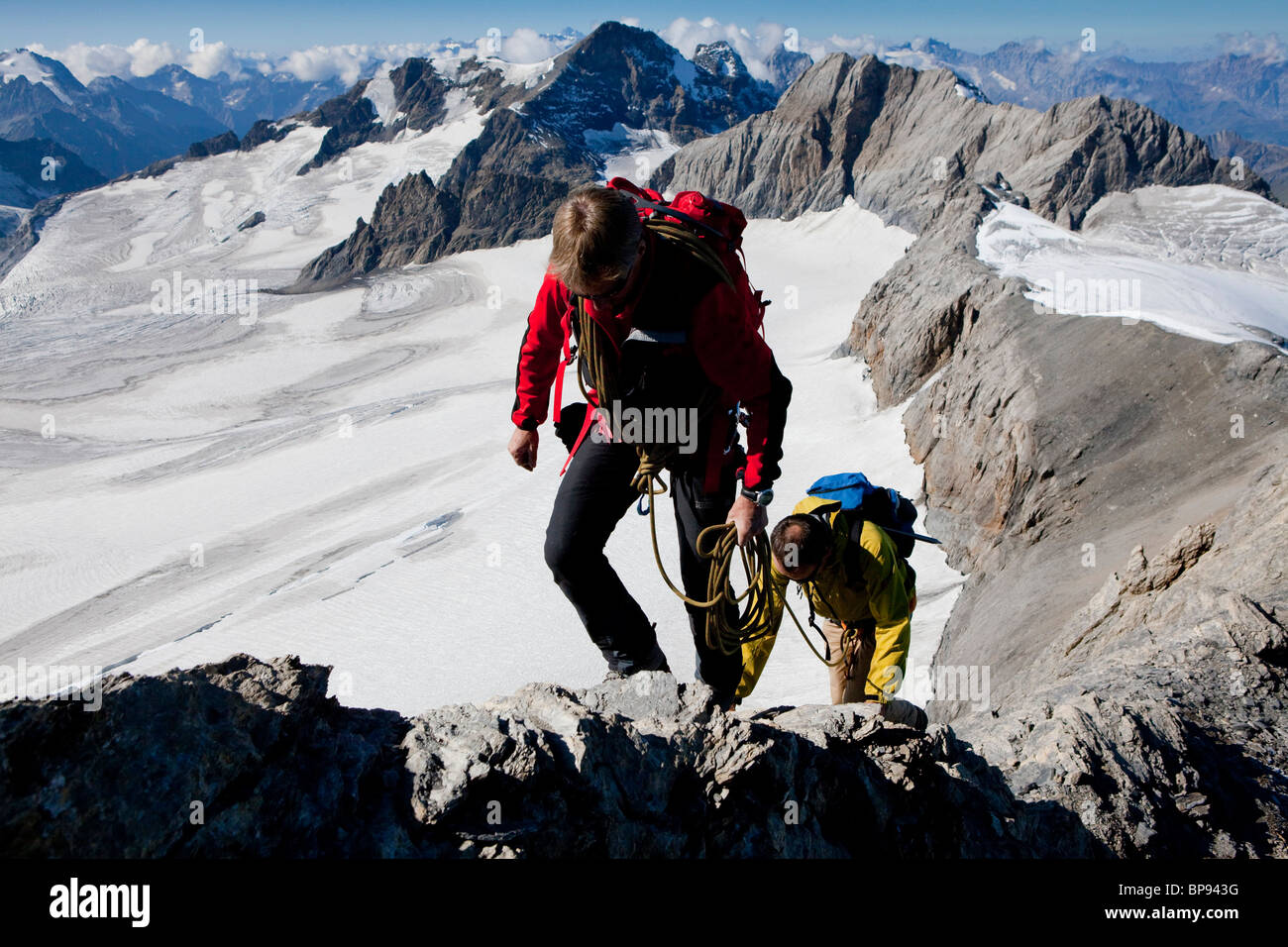 Two mountaineers ascending, Clariden, Canton of Uri, Switzerland Stock ...