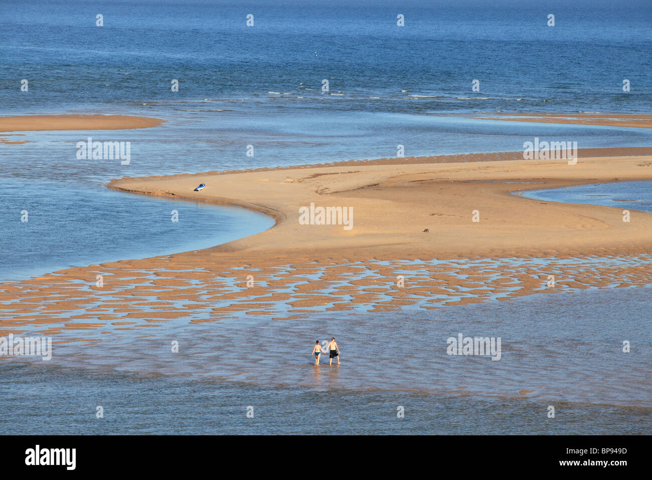 A couple enjoying the day on the sea (Ria Formosa, Algarve, south coast ...