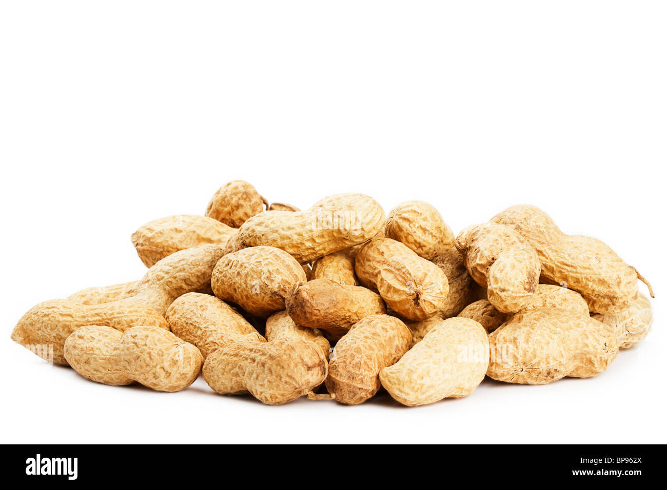 a lot of peanuts on white background Stock Photo - Alamy