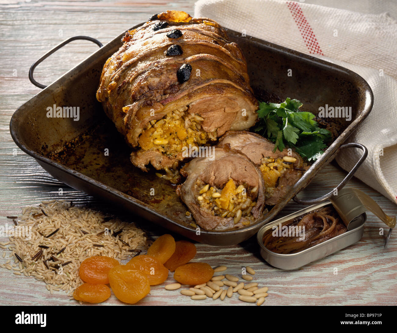 Boned rolled shoulder of lamb stuffed with apricots rice spices pine ...