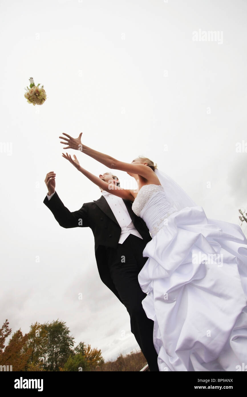 Catching wedding bouquet hi-res stock photography and images - Alamy