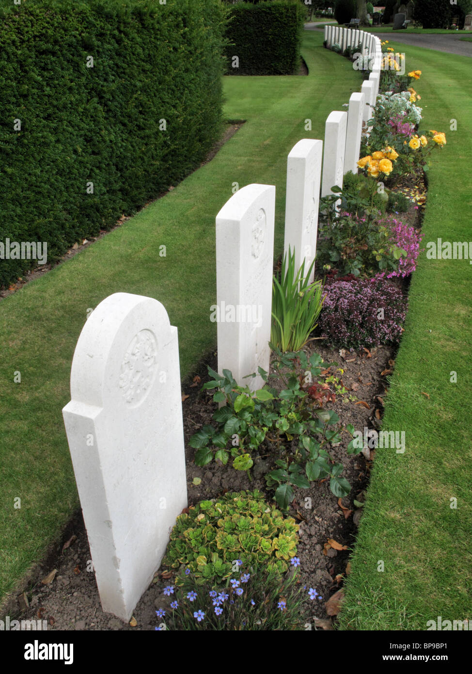 A row of gravestones of naval and RAF men who were killed during the ...