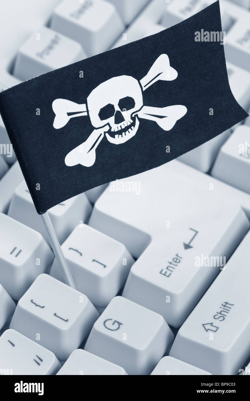 Pirate Flag and Computer Keyboard, concept of Computer Hacker Stock ...