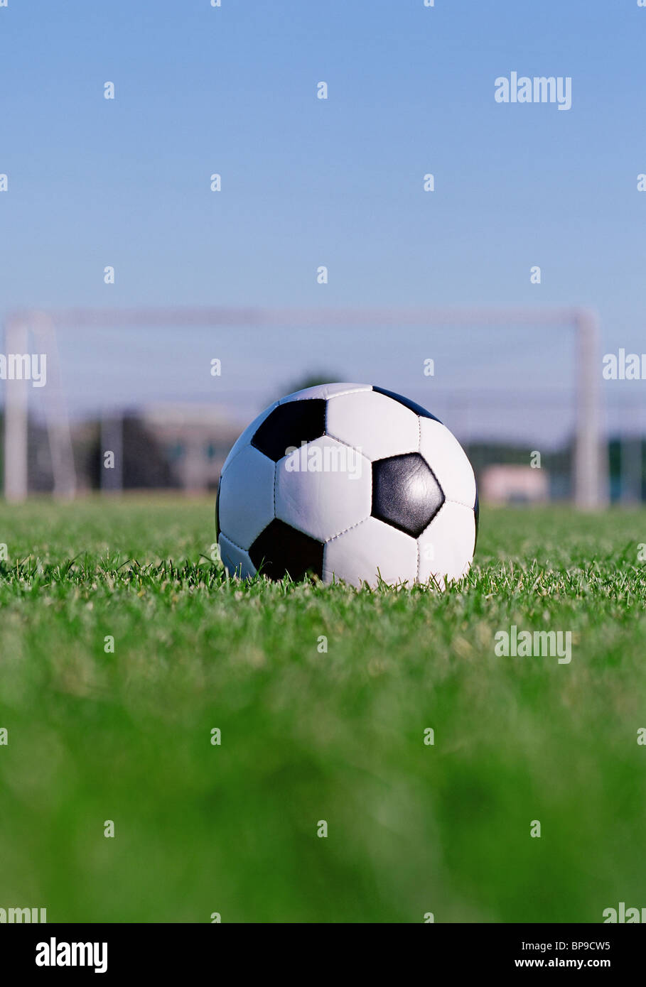 Football in the goal net Stock Photo - Alamy