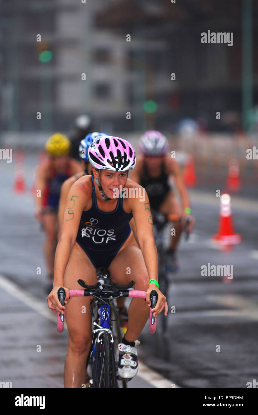 woman triathlon cycling Stock Photo - Alamy