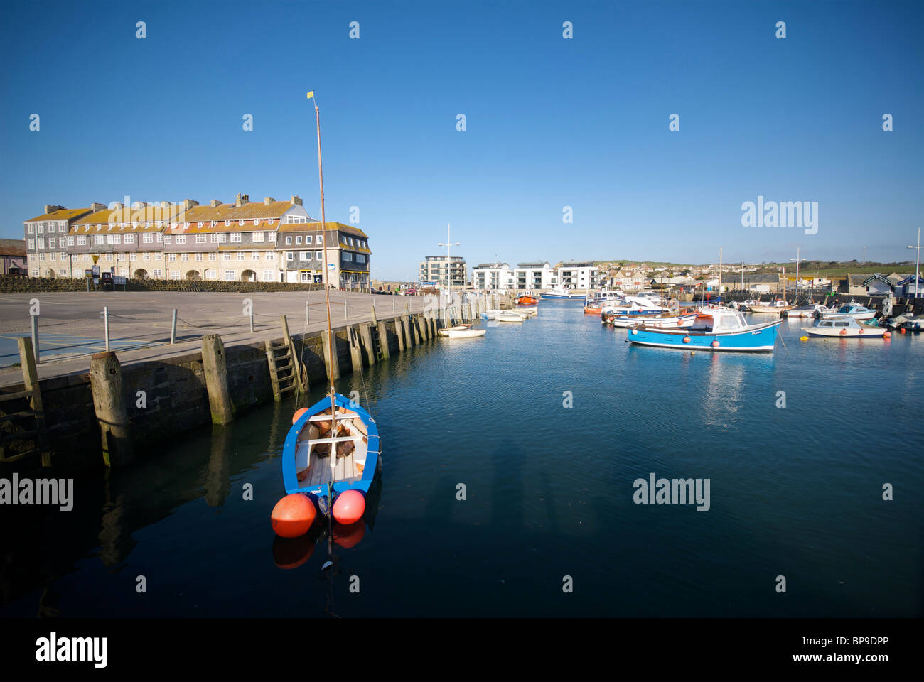 West Bay Dorset UK Harbor Harbour Quay Fishing Boats Stock Photo - Alamy