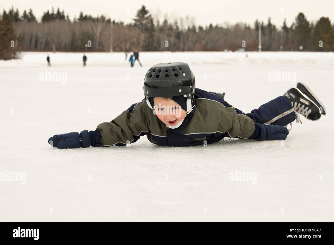 Falling on ice skates hi-res stock photography and images - Alamy