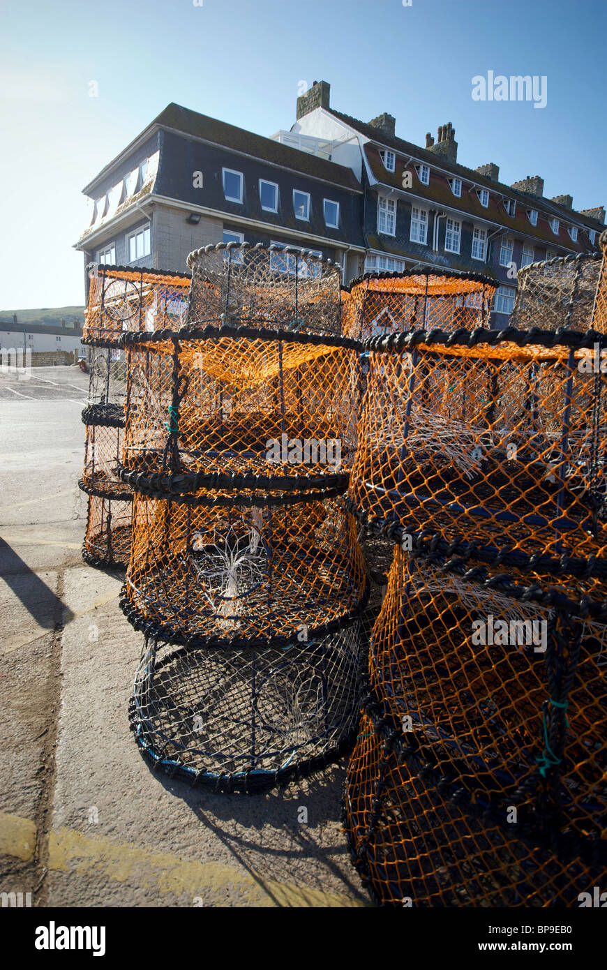 West Bay Dorset UK Harbor Harbour Quay Fishing Boats Lobster Pots Stock ...
