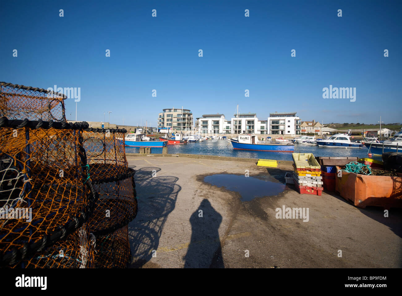 West Bay Dorset UK Harbor Harbour Quay Fishing Boats Lobster Pots Stock ...