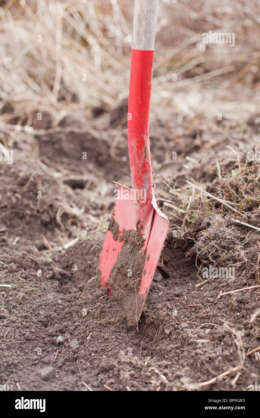 Put a spade to the soil hi-res stock photography and images - Alamy