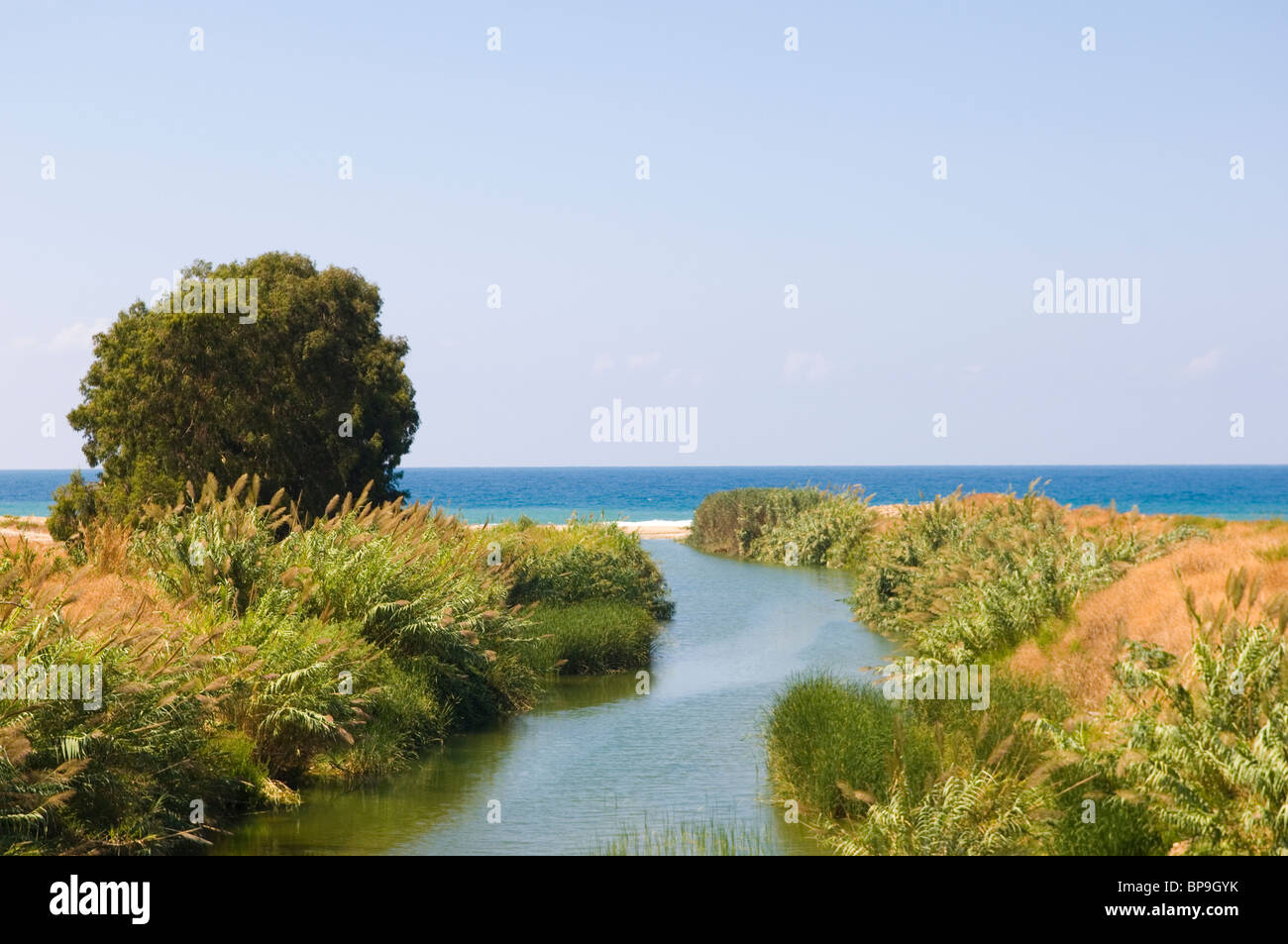 River flowing into into the Mediterranean sea in Tyr Lebanon Stock ...