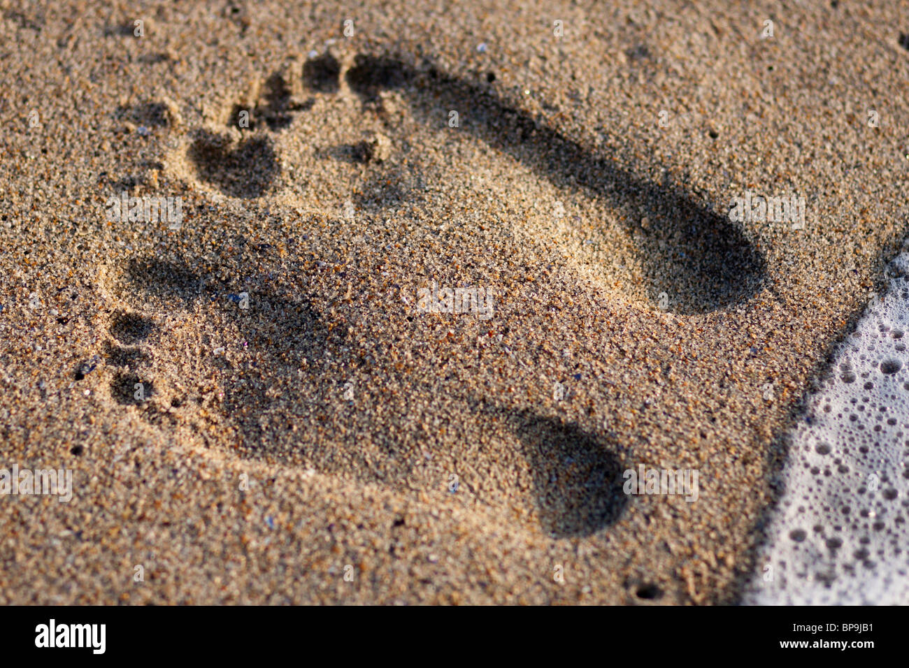 Woman toes sand hi-res stock photography and images - Alamy