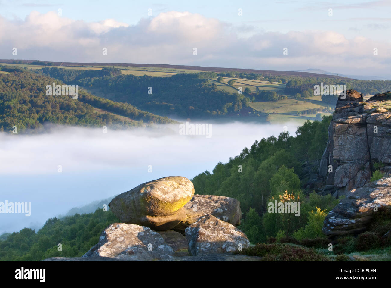 A misty Spring morning viewed from Curbar Edge looking over the mist ...
