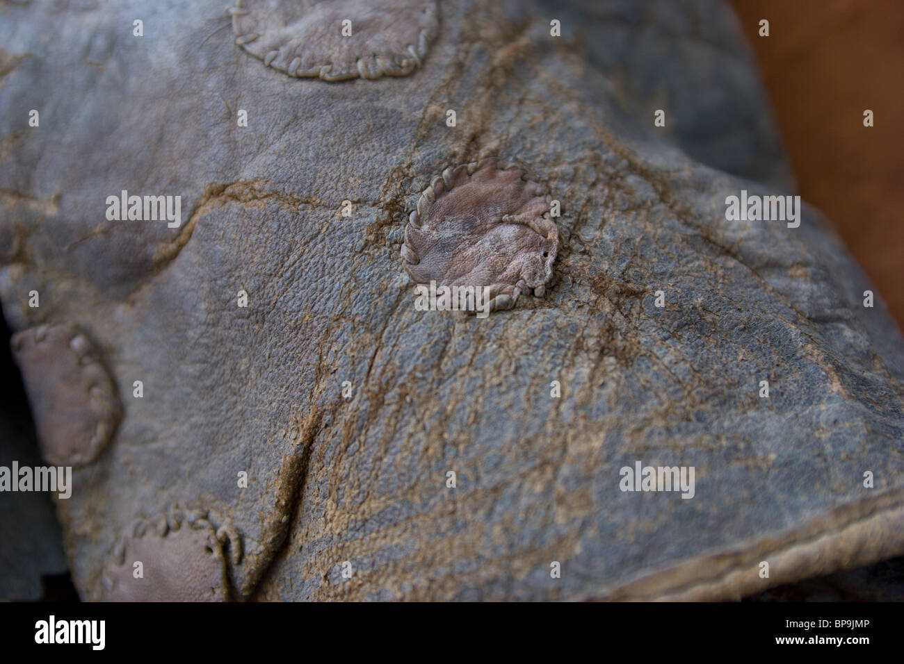 Ancient African sewn leather artifact - texture Stock Photo - Alamy