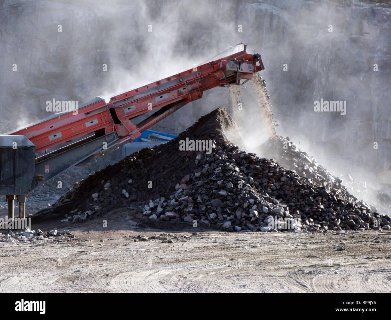 Crushed piling up below conveyor hi-res stock photography and images ...