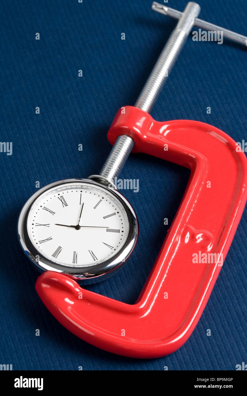 Vise Grip and Clock, Concept of busy Stock Photo - Alamy