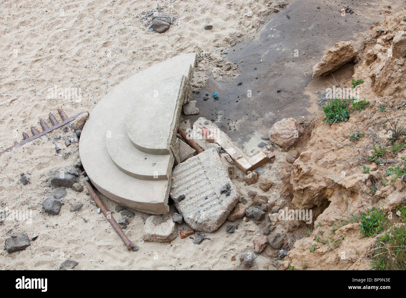 House steps that collapsed into the sea due to coastal erosion in ...