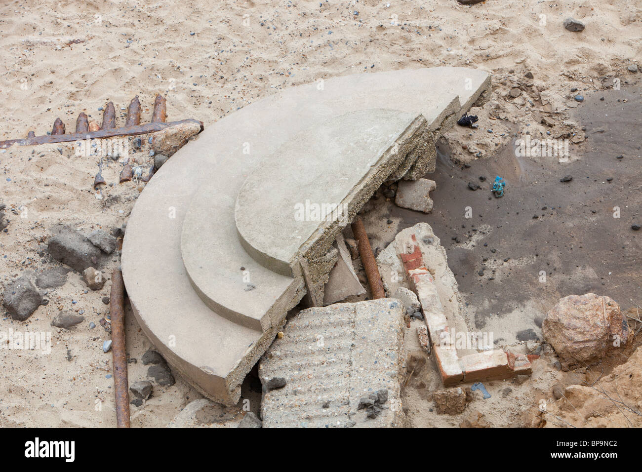 House steps that collapsed into the sea due to coastal erosion in ...