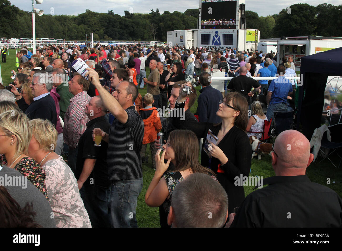 The crowded grandstand of Celebrating Racegoers on Saturday 21st August ...