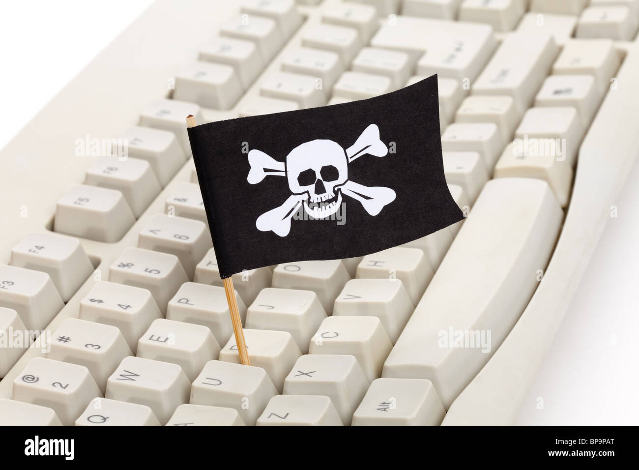 Pirate Flag and Computer Keyboard, concept of Computer Hacker Stock ...