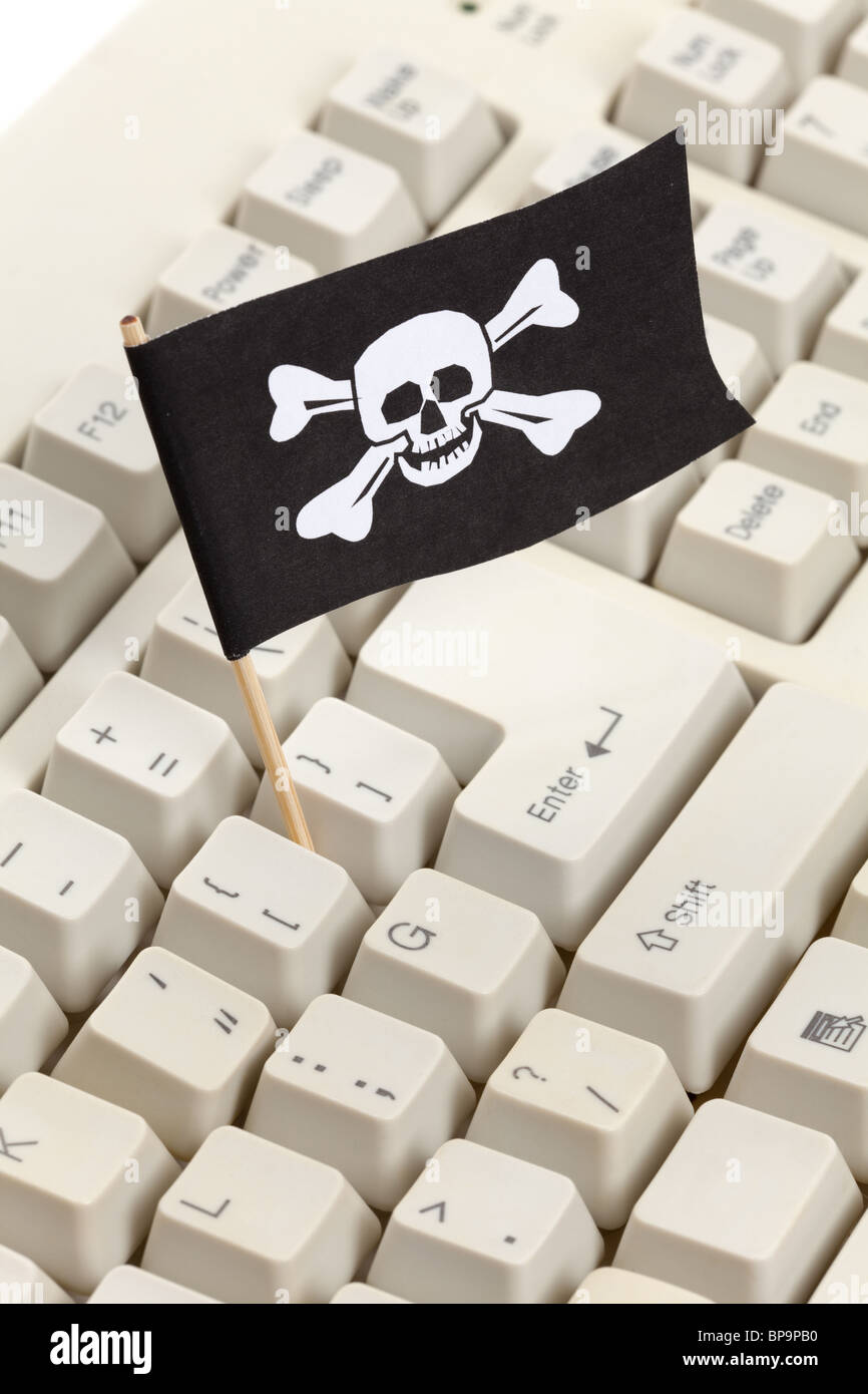 Pirate Flag and Computer Keyboard, concept of Computer Hacker Stock ...