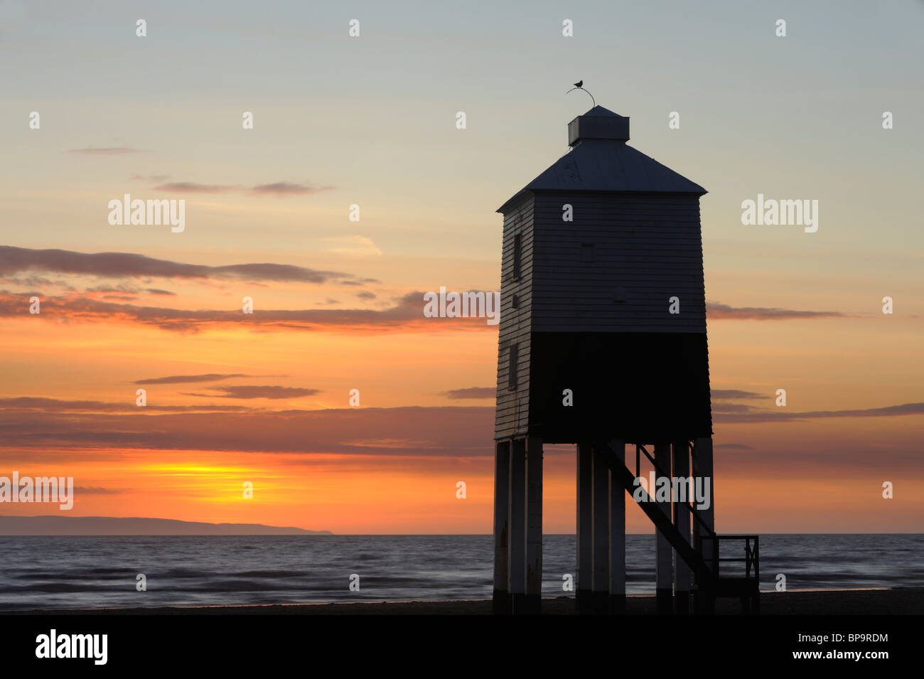 The wooden lighthouse at Burnham-on-Sea, Somerset, with a warm sunset ...
