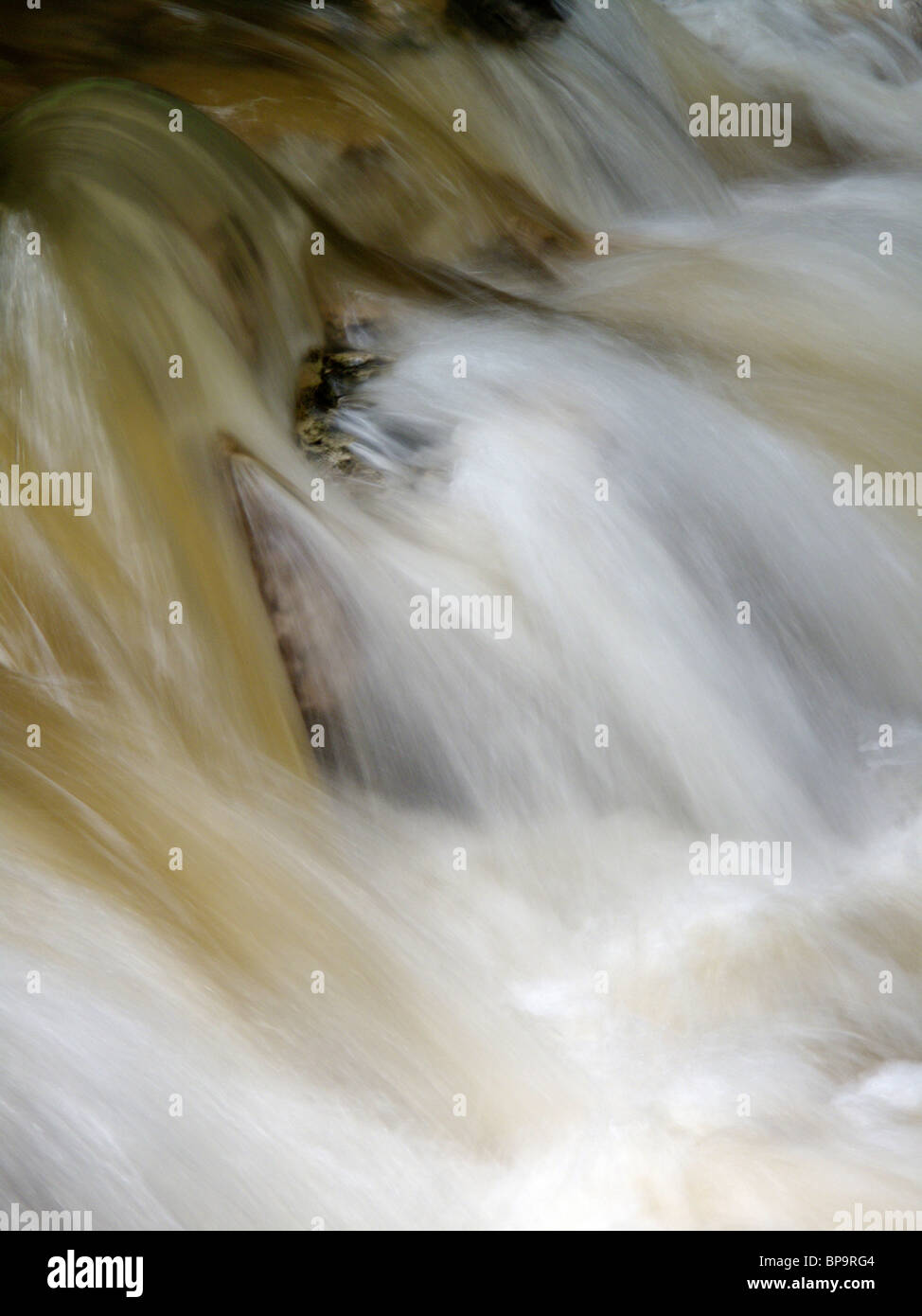 Water running over rocks with motion blur Stock Photo - Alamy