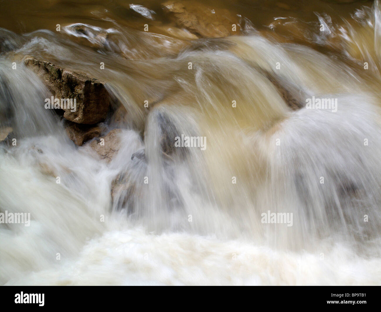Water running over rocks with motion blur Stock Photo - Alamy