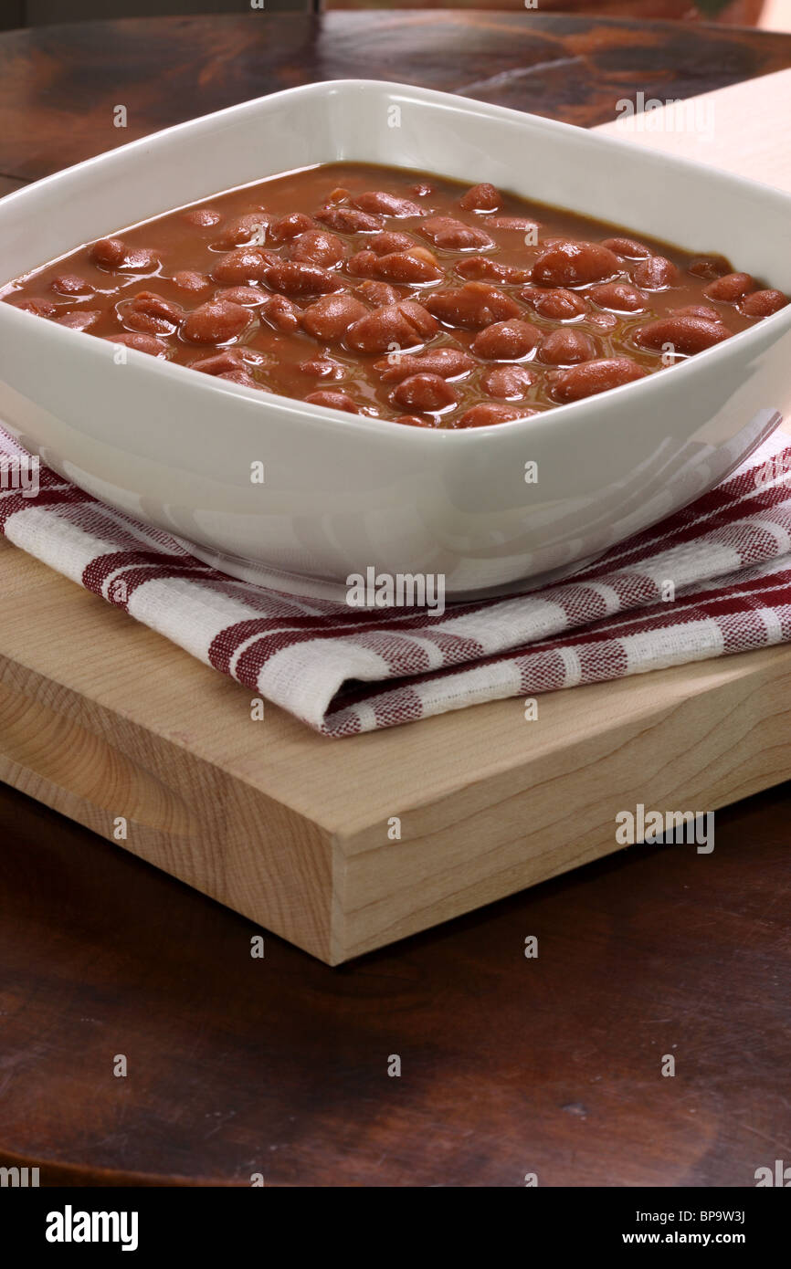 Hot delicious beans served on fancy maple table station, fresh and ...