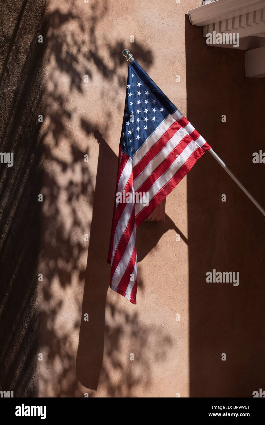 American flag hangs outside a commercial building in Santa Fe, New ...