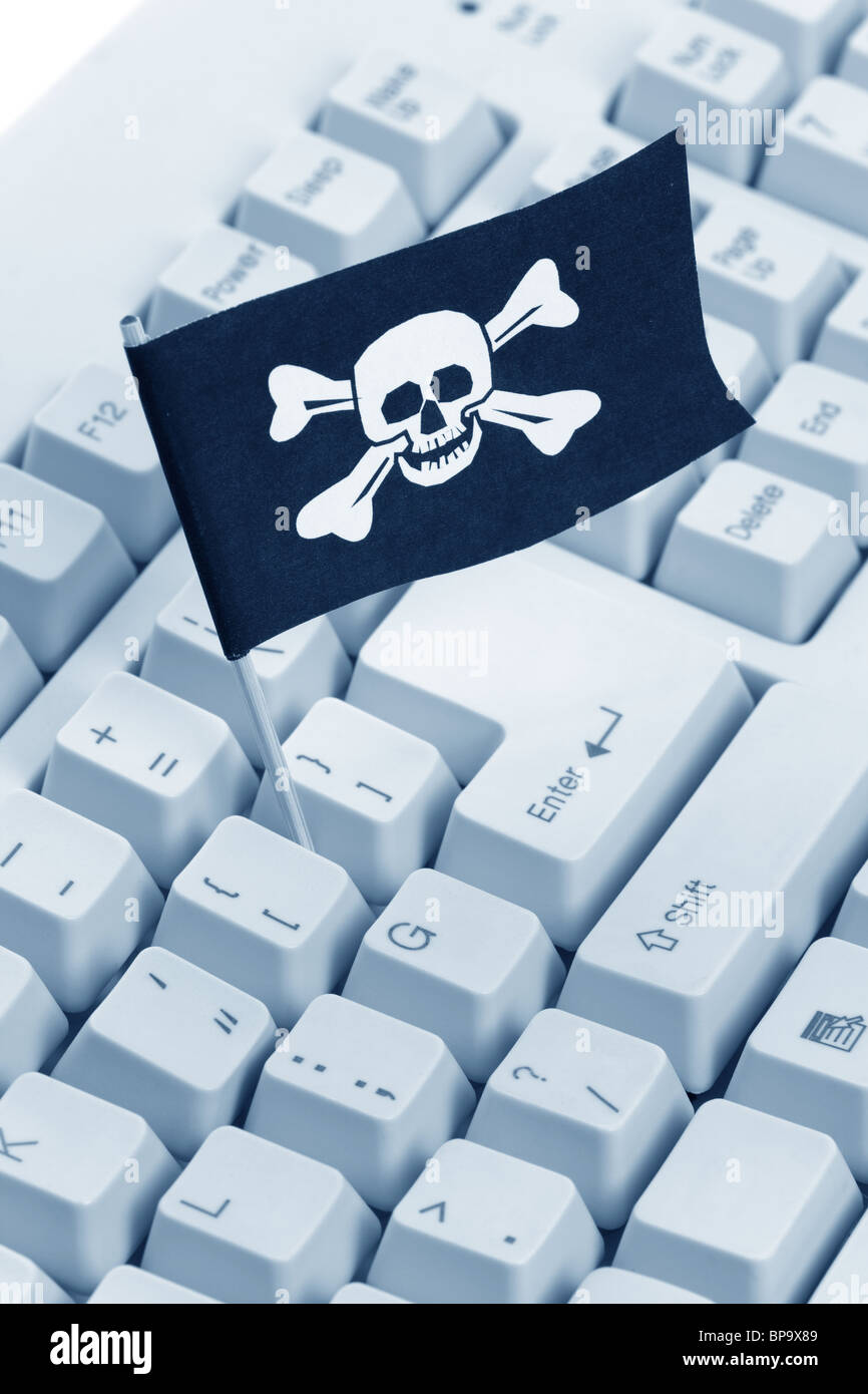 Pirate Flag and Computer Keyboard, concept of Computer Hacker Stock ...