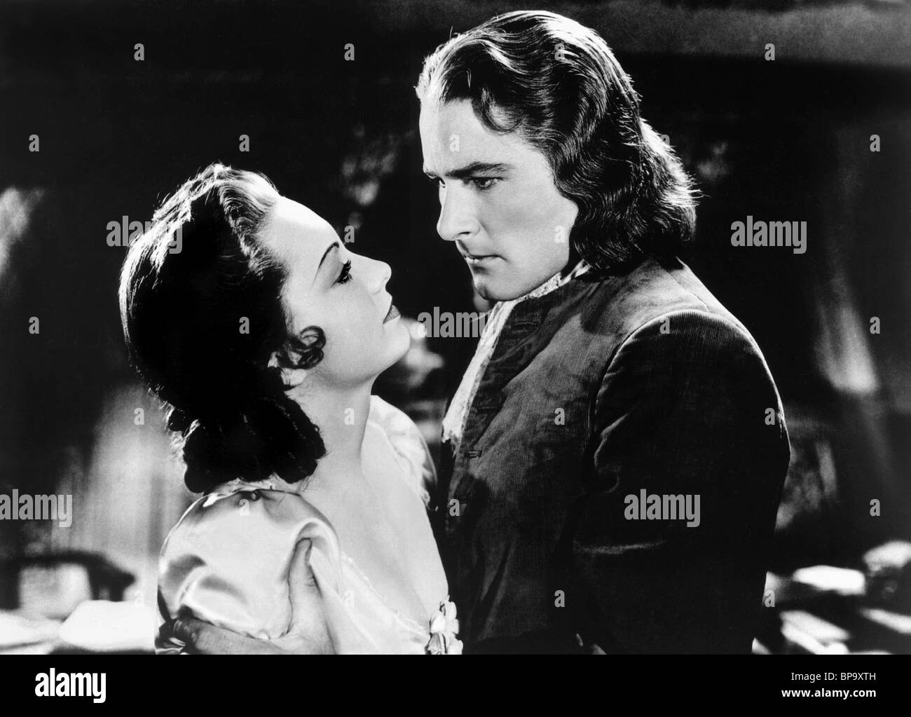 OLIVIA DE HAVILLAND, ERROL FLYNN, CAPTAIN BLOOD, 1935 Stock Photo - Alamy