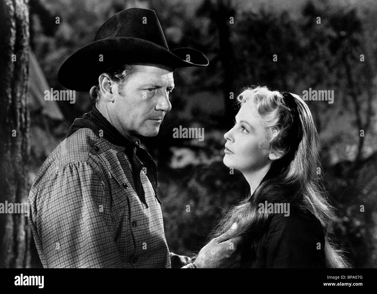 JOEL MCCREA, ARLENE DAHL, THE OUTRIDERS, 1950 Stock Photo - Alamy
