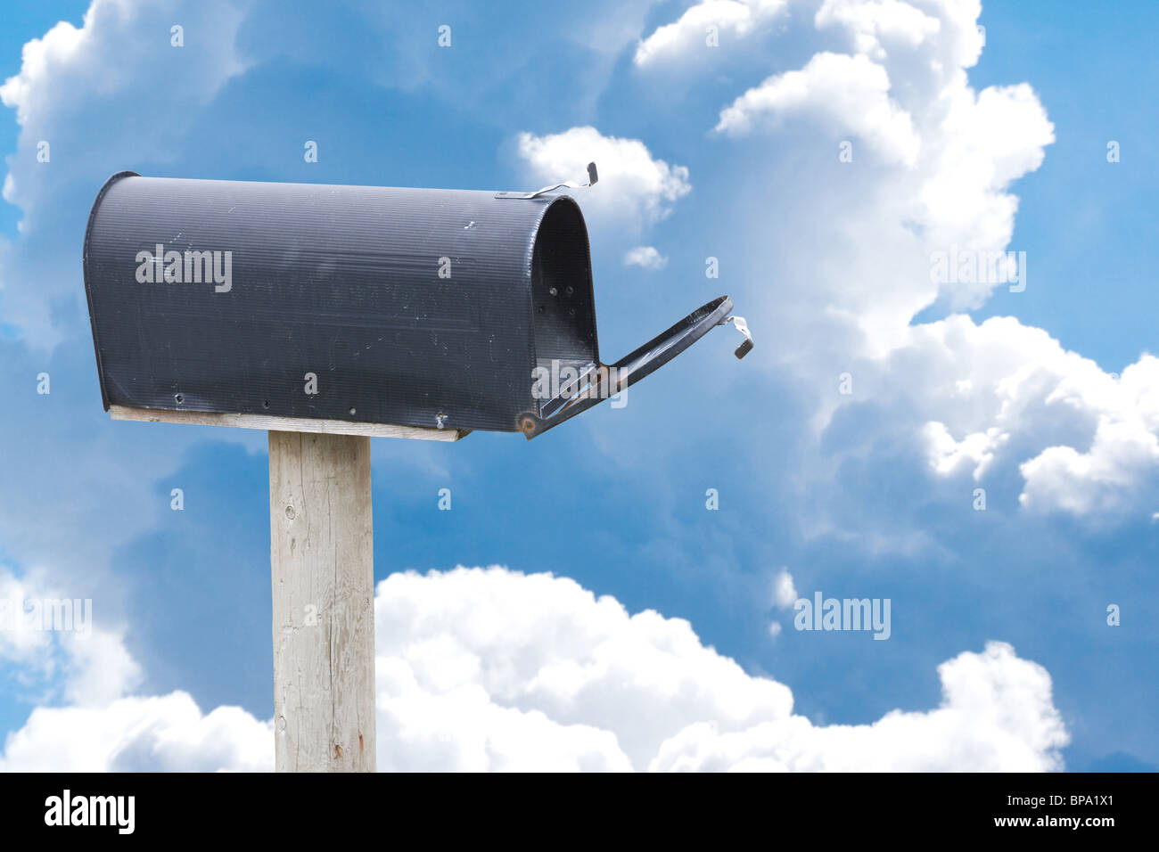 Black Mailbox and blue sky Stock Photo - Alamy