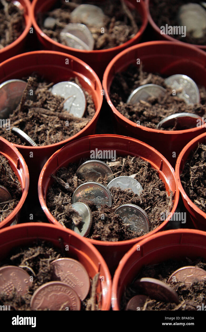 British coins 'growing' in plant pots Stock Photo - Alamy