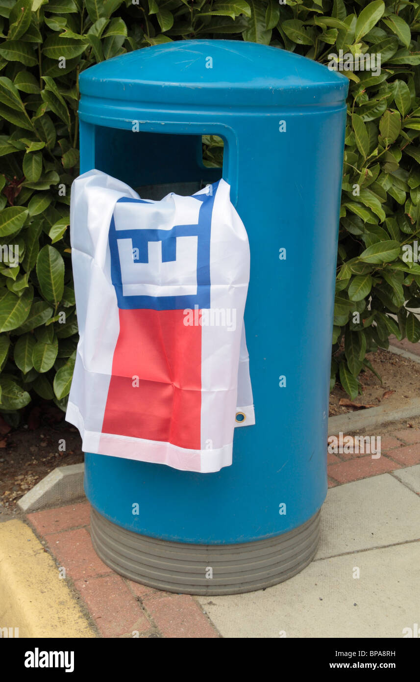 An England flag stuffed in a bin to symbolize the disappointment of an ...