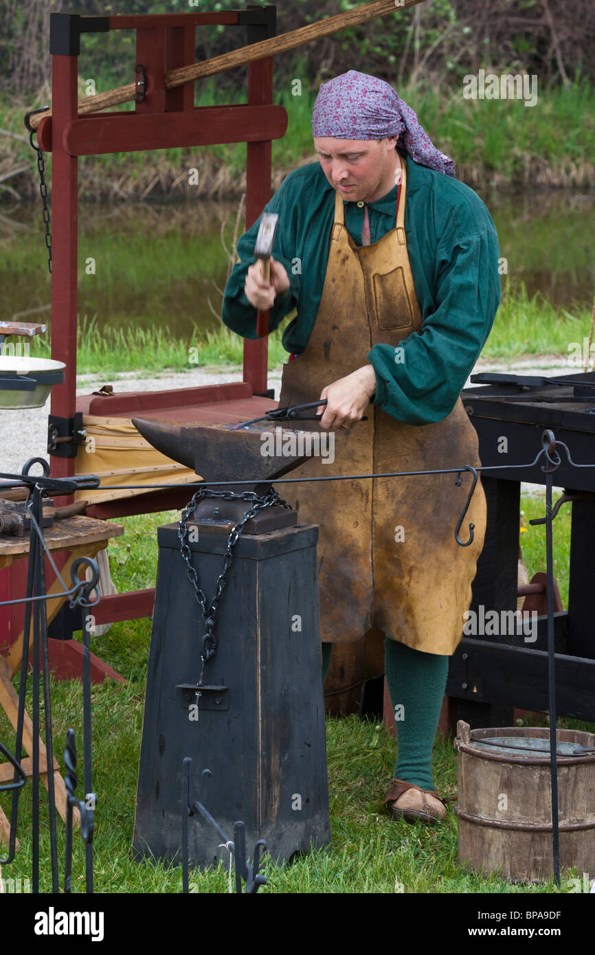 Holland Michigan a man blacksmith with traditional costume during trade ...