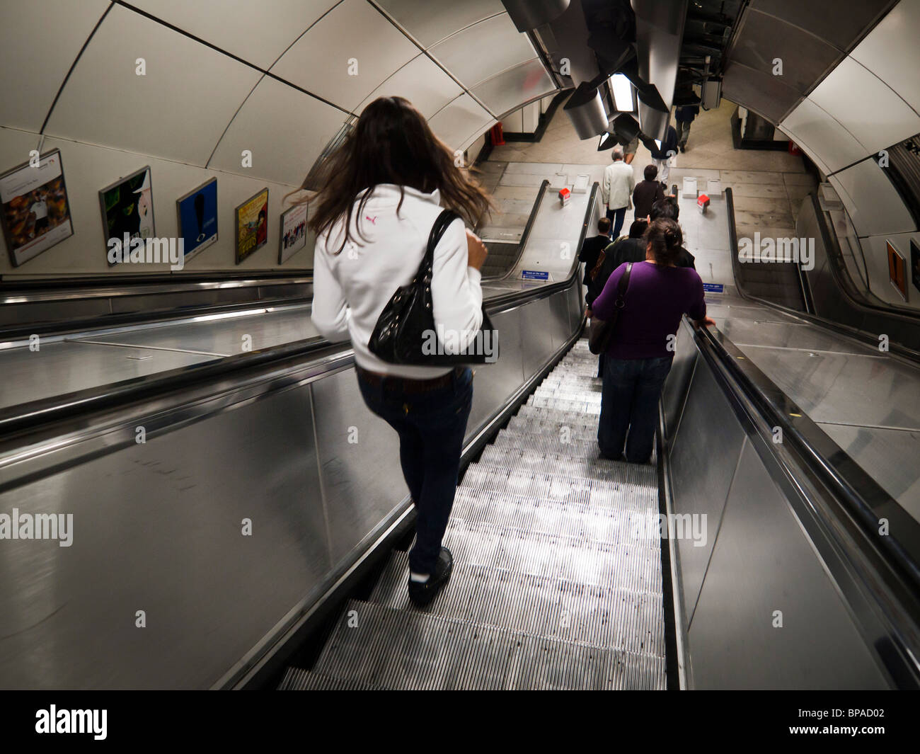 Travelling down escalator at London Bridge Underground station Stock ...