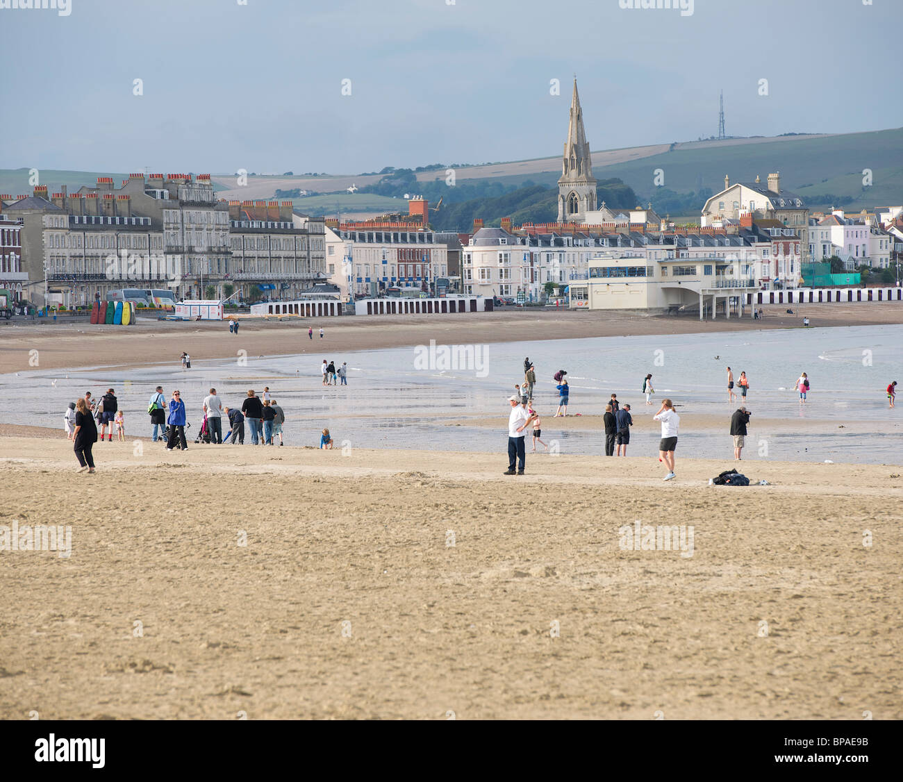 View of beach and The Esplanade seafront with Spire, Weymouth, Dorset ...