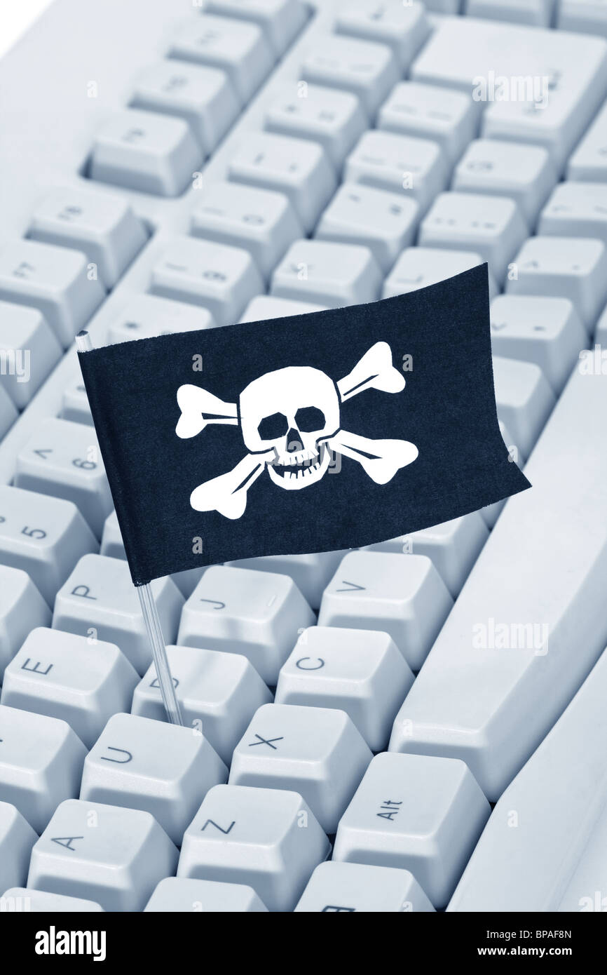 Pirate Flag and Computer Keyboard, concept of Computer Hacker Stock ...