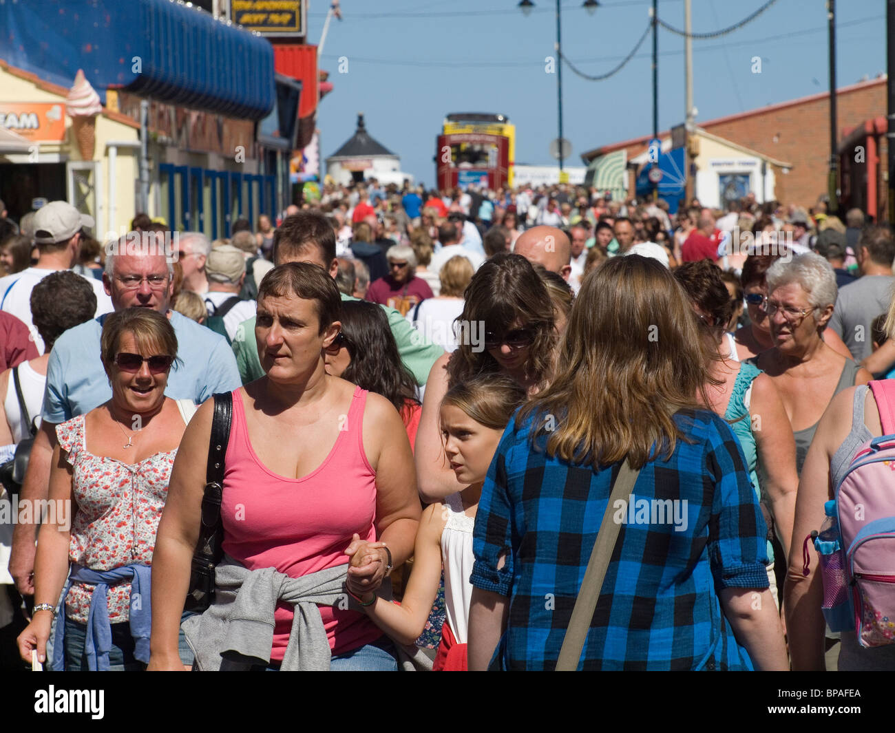A dense crowd of people in Pier Road Whitby during the annual regatta ...