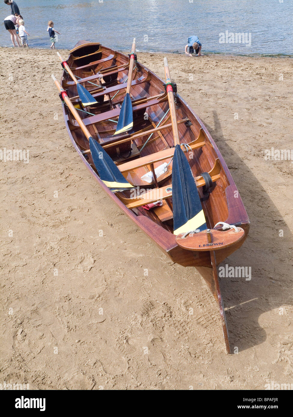 A traditional wooden sea going rowing boat on the beach at Whitby ...