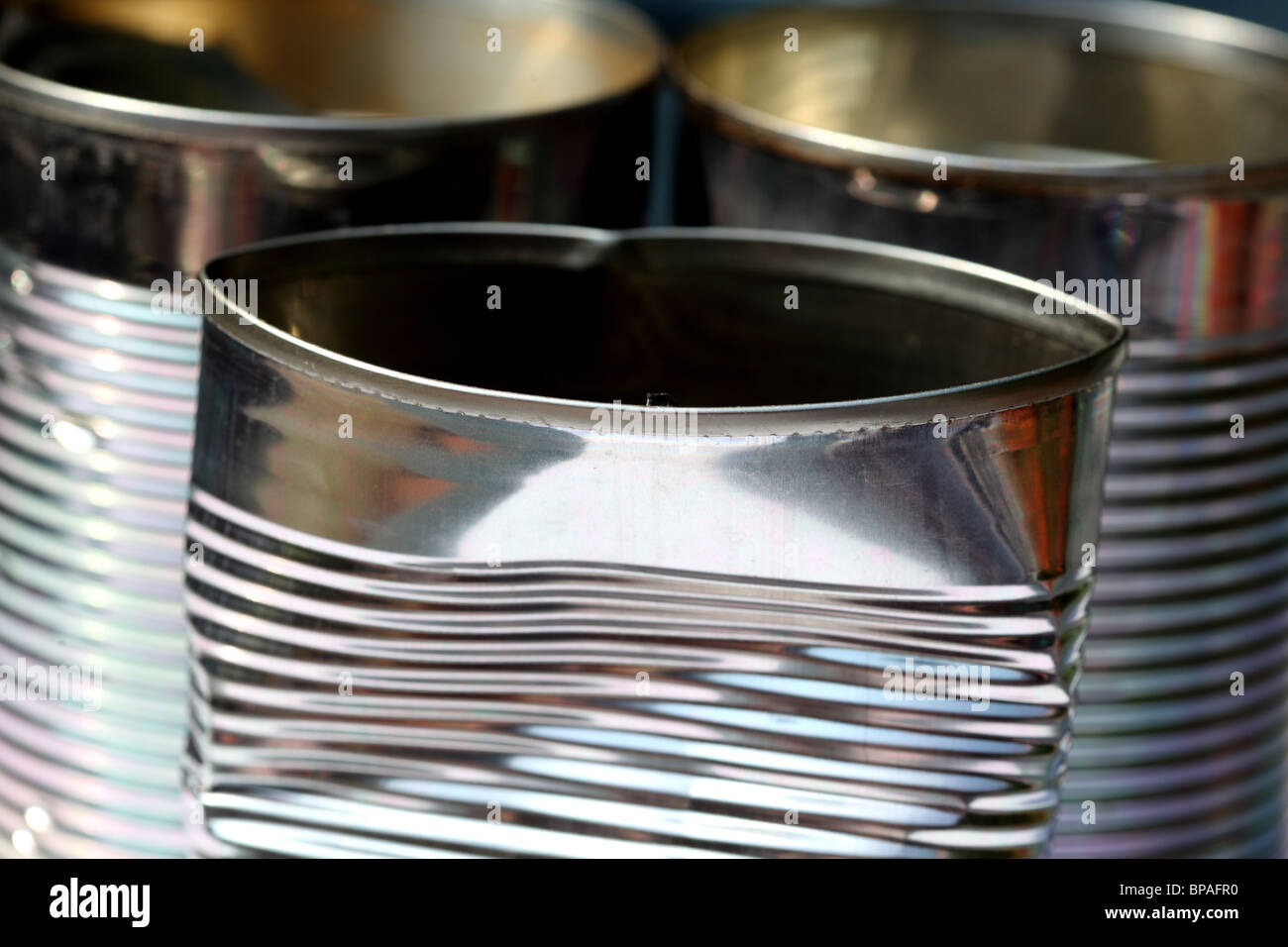 three empty tin cans Stock Photo - Alamy