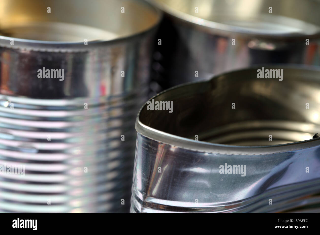 three empty tin cans Stock Photo - Alamy