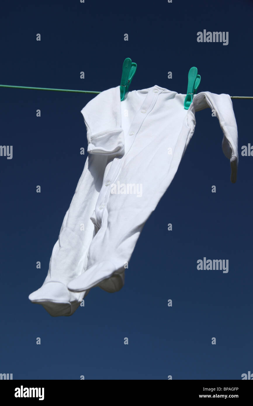 baby grow hanging on the washing line Stock Photo - Alamy